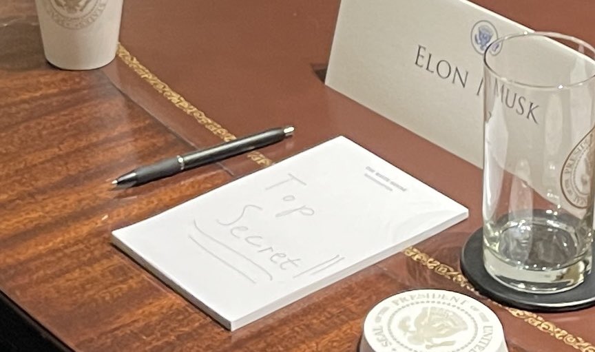 Elon Musk Sparks Speculation with 'Top Secret' Notepad at Trump Cabinet ...