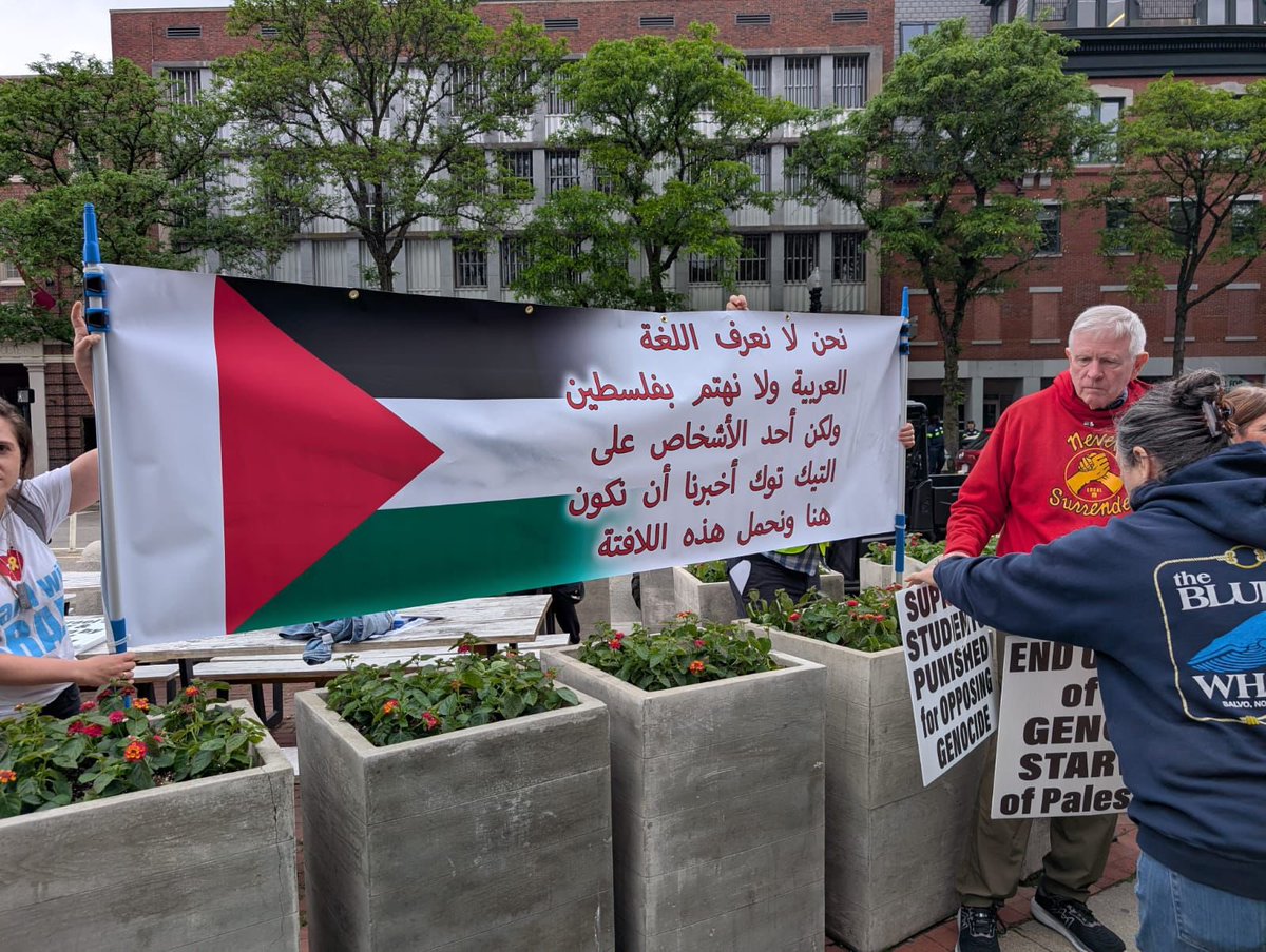 Pro-Palestinian Protestors at Harvard Graduation Hold Banner Saying ...